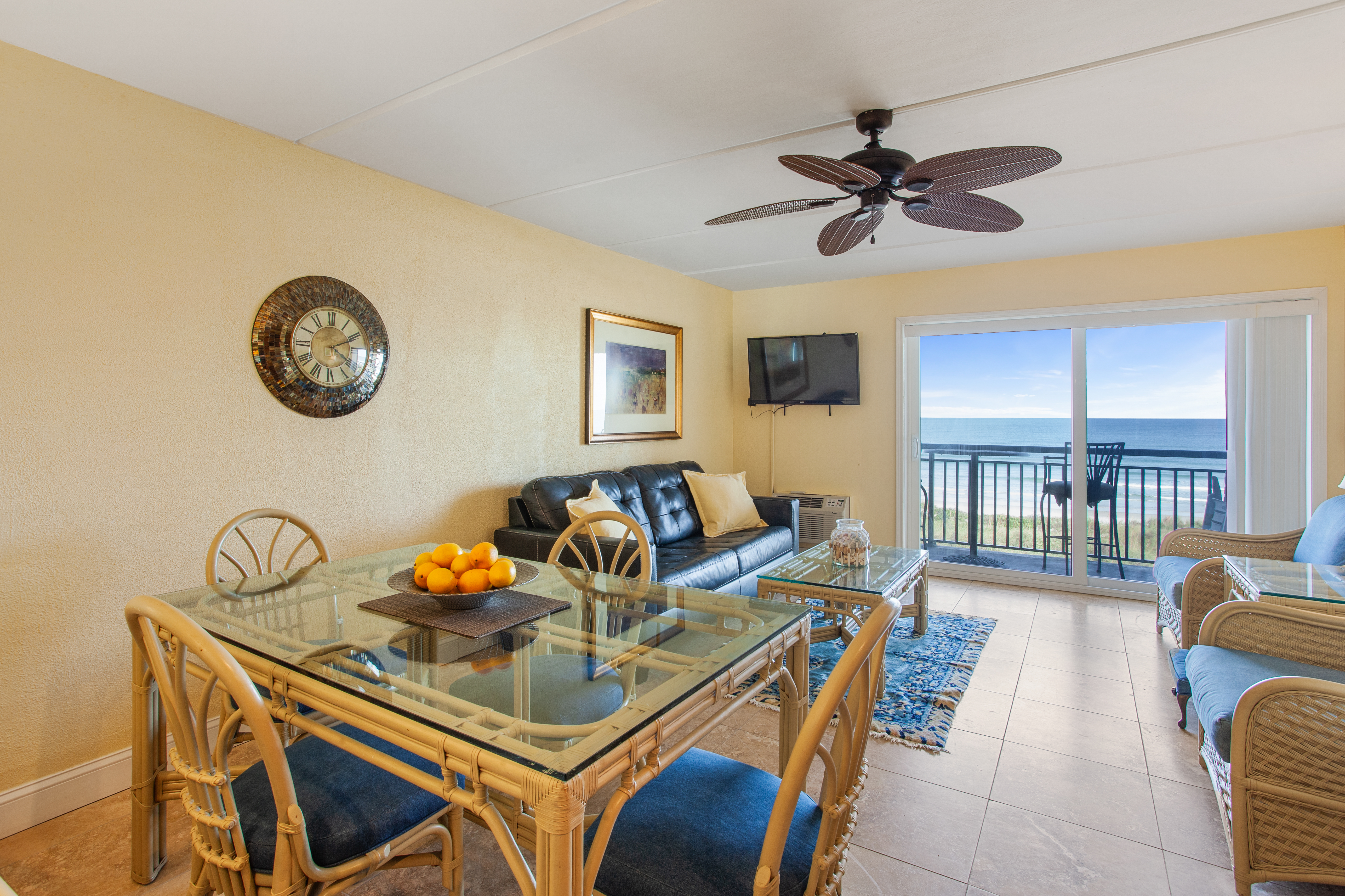 Spacious Kitchen And Leather Sofa - Charming Coastal Suite - Crescent Beach, FL